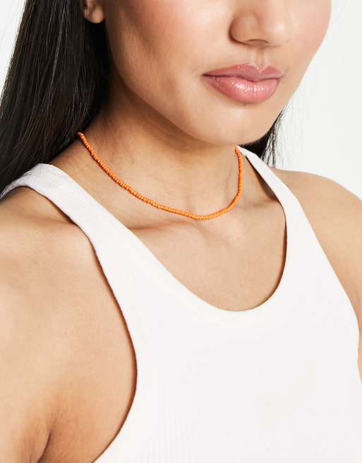 AllSaints - Collier de perles - Orange/doré | ASOS