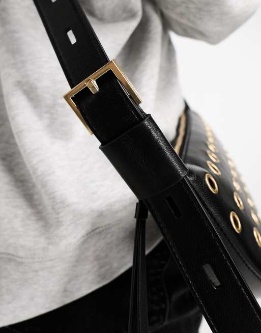 AllSaints leather half moon eyelet crossbody bag in black | ASOS