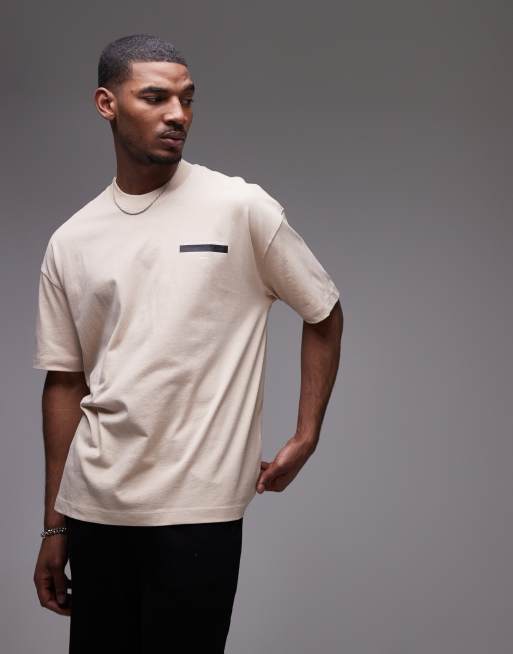 AllSaints Redact oversized embroidered logo t-shirt in dusty light ...