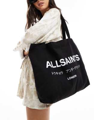 AllSaints Underground unisex acid tote bag in black | ASOS