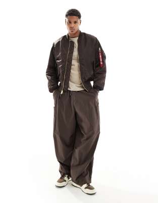 Alpha Industries MA1 bomber jacket in brown | ASOS