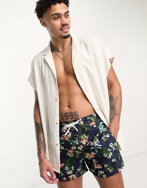 Another Influence swim shorts in navy floral print | ASOS