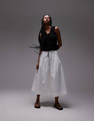 ARKET - Maxi rok met aangerimpelde taille en plat gestikte plooien in ...