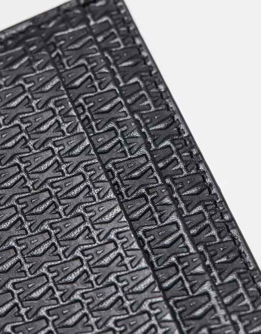 Armani Exchange logo embossed leather credit card holder in black | ASOS