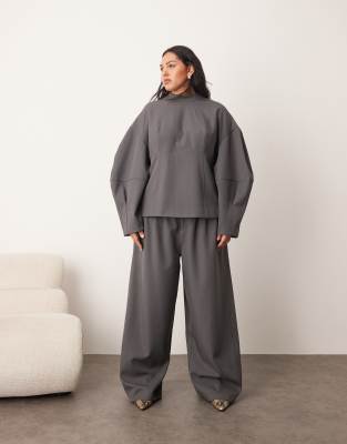 ARRANGE Curve tailored seam detail sculpted top with ovoid sleeves and ...