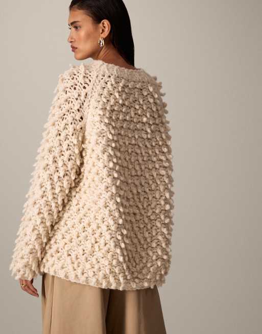 ARRANGE pure wool hand knit ultimate loop fringe sweater in cream | ASOS