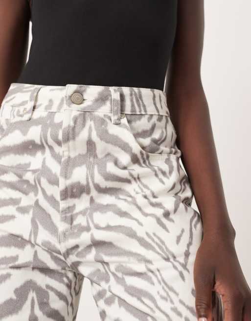 ARRANGE Sydney denim barrel leg jeans in tiger print | ASOS