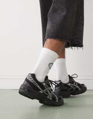Asics – Gel-1130 – Svarta och silverfärgade sneakers | ASOS