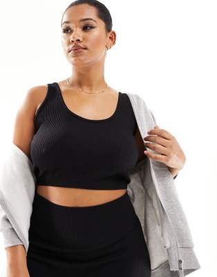 ASOS 4505 Curve – Icon – Nahtloser, gerippter Sport-BH in Schwarz mit ...