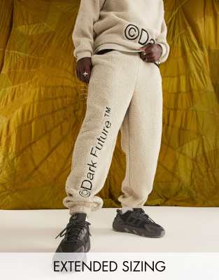 ASOS Dark Future co-ord relaxed joggers in teddy borg with leg logo embroidery in neutral | ASOS
