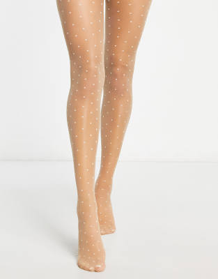 ASOS DESIGN 30 denier mini polka dot tights in beige with white spot | ASOS
