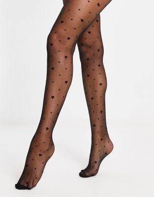 ASOS DESIGN 30 denier polka dot and heart tights in black | ASOS