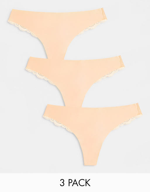 ASOS DESIGN – 3er-Pack sich nicht abzeichnende Spitzen-Tangas in Beige ... ASOS DESIGN – 3er-Pack sich nicht abzeichnende Spitzen-Tangas in Beige ...
