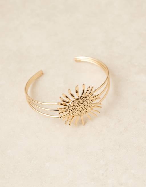 ASOS DESIGN arm cuff with enameled sun design in gold tone | ASOS