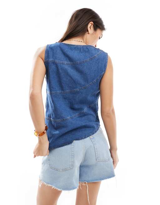 ASOS DESIGN asymmetric denim top with exposed seams in mid blue | ASOS