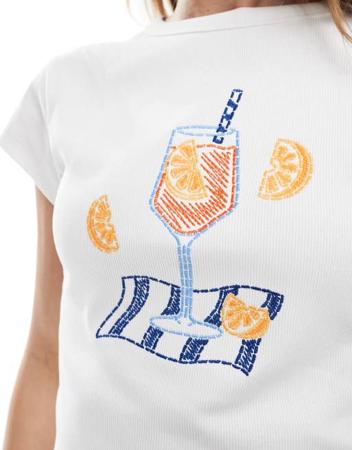 ASOS DESIGN baby tee with orange cocktail drink graphic in cream | ASOS