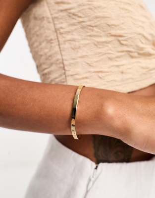 ASOS DESIGN bangle bracelet in gold tone | ASOS