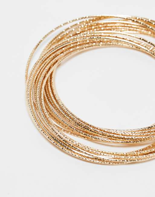 ASOS DESIGN bangle bracelets with multi fine wire design in gold tone ...