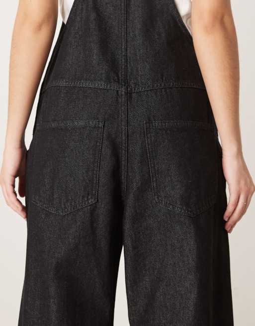 ASOS DESIGN barrel leg denim dungarees in black | ASOS