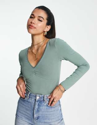 ASOS DESIGN - Body à manches longues avec col en V et bordures en ...