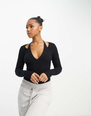 ASOS DESIGN - Body dos nu côtelé à manches longues et décolleté ...