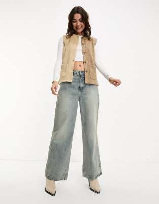 ASOS DESIGN boucle knit spliced vest in ecru and taupe | ASOS