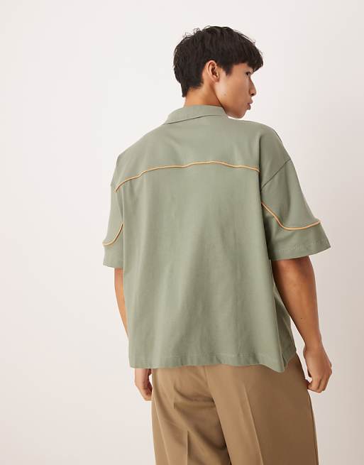 ASOS DESIGN boxy oversized polo shirt with city print in ASOS DESIGN boxy oversized polo shirt with city print in
