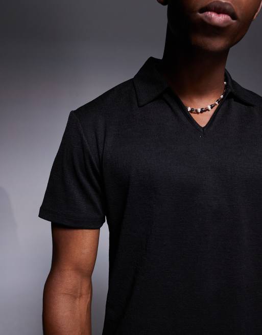 ASOS DESIGN boxy polo shirt with deep neckline in black texture | ASOS