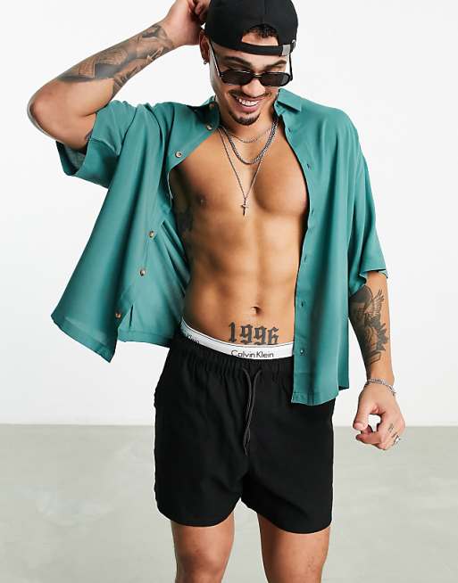 ASOS DESIGN - Camicia oversize squadrata in viscosa verde slavato | ASOS ASOS DESIGN - Camicia oversize squadrata in viscosa verde slavato | ASOS