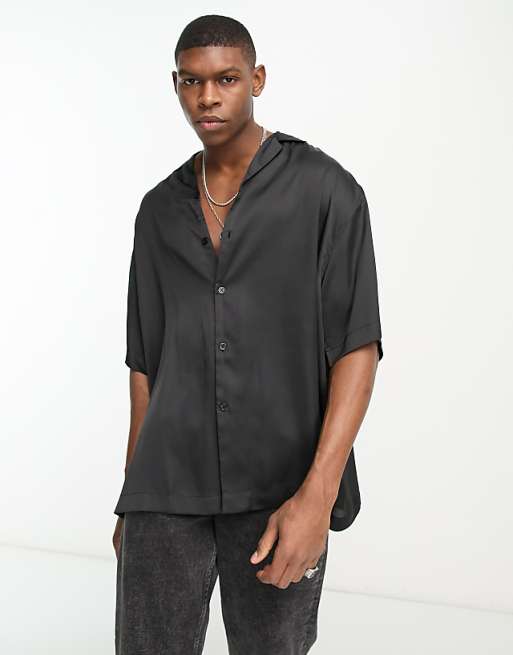 ASOS DESIGN - Camicia oversize taglio lungo nera in raso | ASOS ASOS DESIGN - Camicia oversize taglio lungo nera in raso | ASOS
