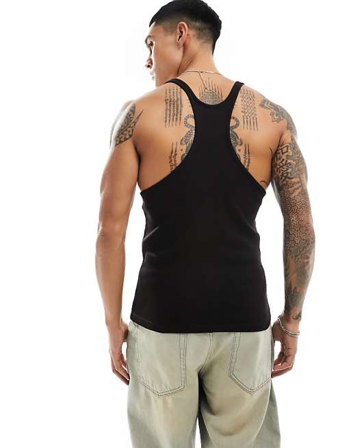 ASOS DESIGN - Canotta attillata nera a coste con dorso a vogatore ... ASOS DESIGN - Canotta attillata nera a coste con dorso a vogatore ...