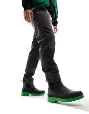 ASOS DESIGN chelsea wellington boots in black with green contrast sole ...