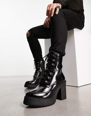 ASOS DESIGN chunky sole heeled lace up boots in black faux leather | ASOS