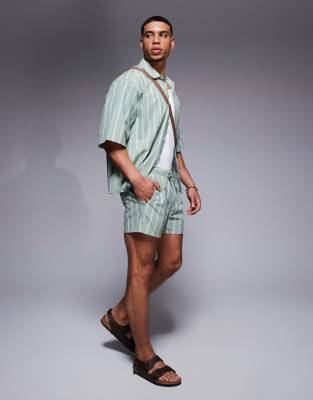 ASOS DESIGN co-ord shorts in short length in green stripe | ASOS