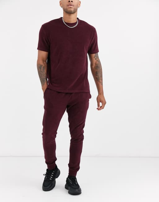 ASOS DESIGN co-ord skinny joggers in burgundy towelling | ASOS