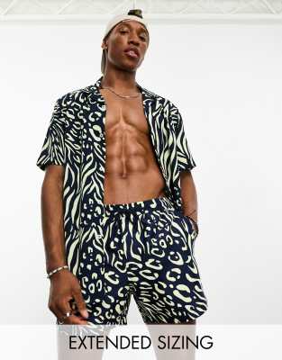 ASOS DESIGN co-ord swim shorts in short length in mixed animal print | ASOS