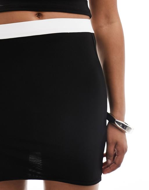 ASOS DESIGN contrast bow mini skirt in black | ASOS