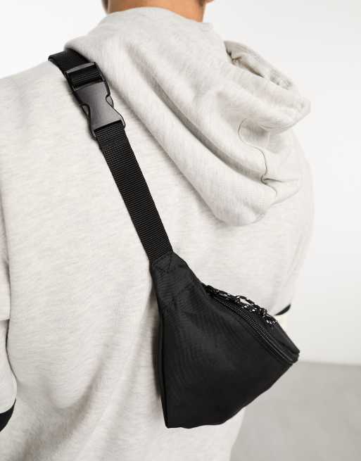 ASOS DESIGN cross body bum bag with contrast puller in black | ASOS