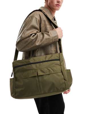 ASOS DESIGN cross body tote bag with pockets in khaki | ASOS