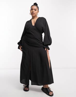 ASOS DESIGN Curve - Diepuitgesneden maxi jurk met vleermuismouwen in zwart | ASOS