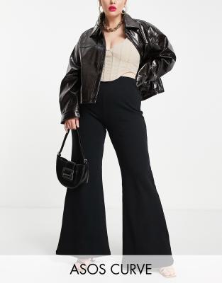 ASOS DESIGN Curve Edit holding power rib flare trousers in black | ASOS