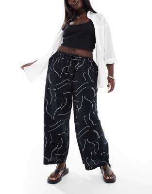 ASOS DESIGN Curve - Pantalon ample d'ensemble en lin avec imprimé - Noir et blanc | ASOS