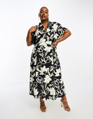 ASOS DESIGN Curve - Robe ceinturée mi-longue à col en V et imprimé - Noir et blanc à fleurs | ASOS
