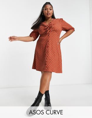 ASOS DESIGN Curve - Robe courte boutonnée et nouée sur le devant - Rouille à pois | ASOS