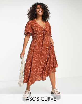 ASOS DESIGN Curve - Robe mi-longue nouée à l'avant à pois et godets - Rouille/ivoire | ASOS