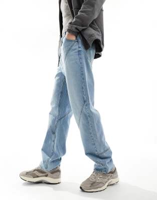 ASOS DESIGN dad fit jeans with paneling detail in mid wash blue | ASOS