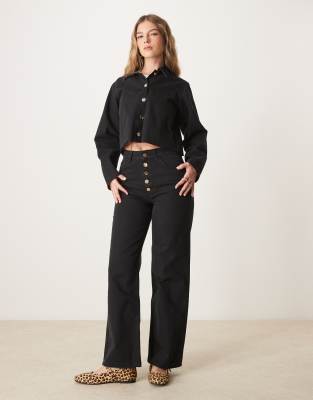 ASOS DESIGN dad jean with gold detail button fly in black | ASOS
