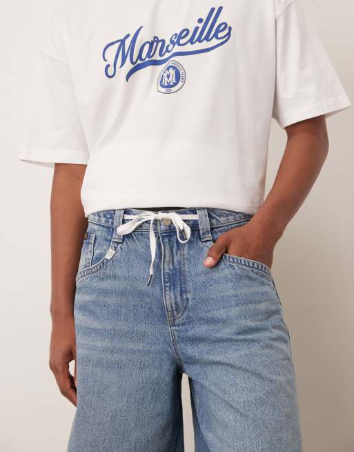 ASOS DESIGN denim jorts with embroidered pockets in light wash blue | ASOS
