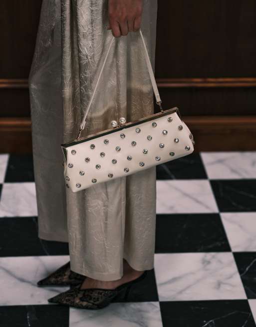 ASOS DESIGN elongated frame clutch bag with diamante studs in cream | ASOS