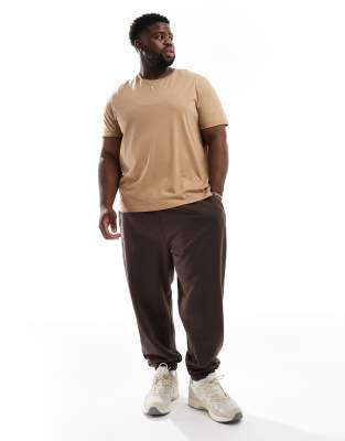 ASOS DESIGN essential oversized trackies in brown | ASOS